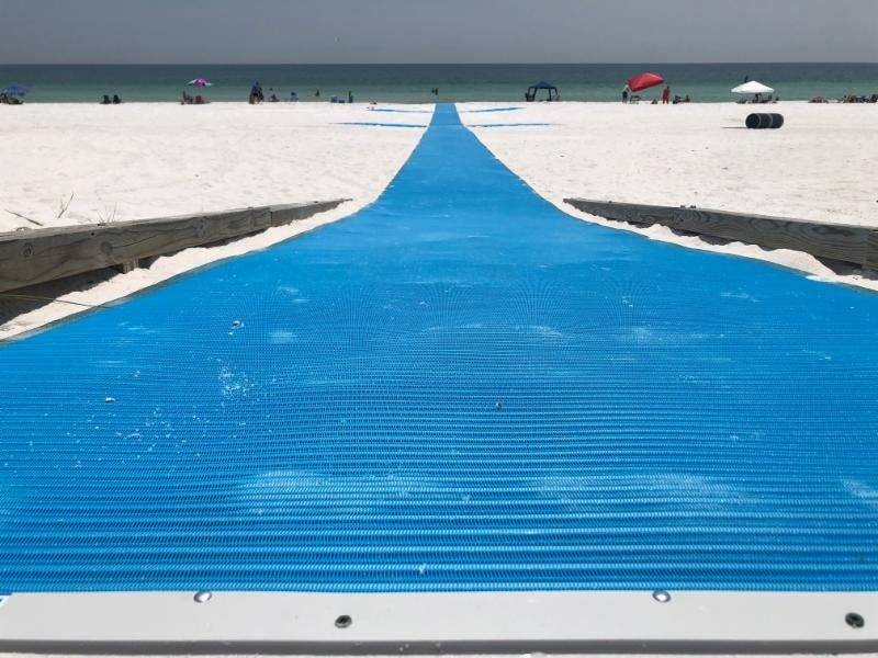 Longer beach mat provides access to gulf for all abilities | Santa Rosa ...